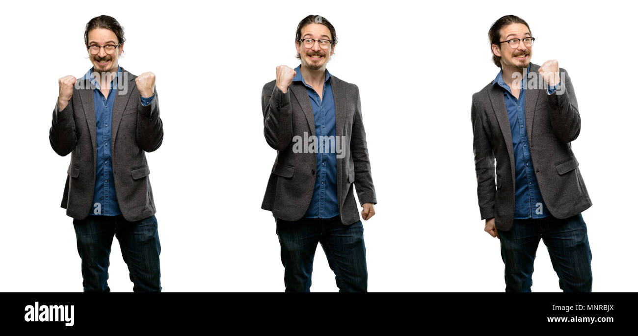 Handsome young man happy and excited celebrating victory expressing big ...