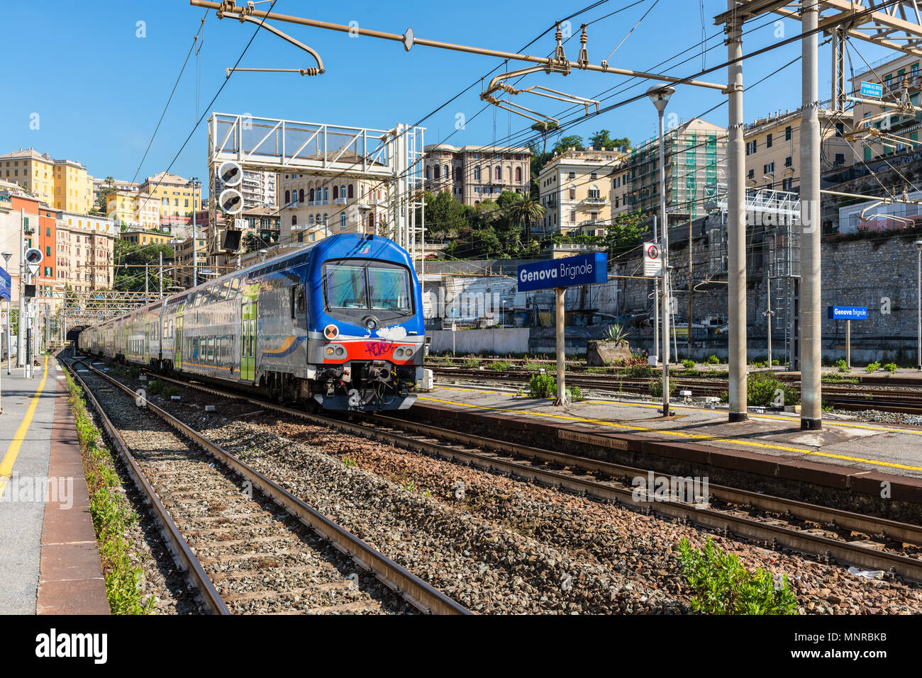 Genoa, Italy - May 15, 2017: Trenitalia passenger train arriving to the ...