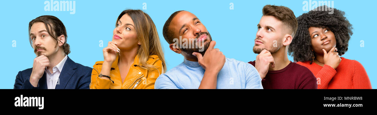 Group of mixed people, women and men thinking and looking up expressing ...