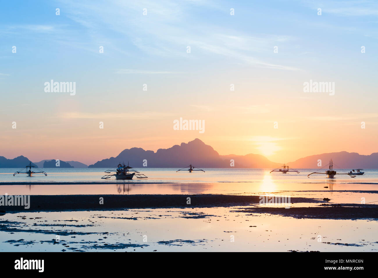 Sunset view from Corong Corong beach near El Nido, Bacuit archipelago ...