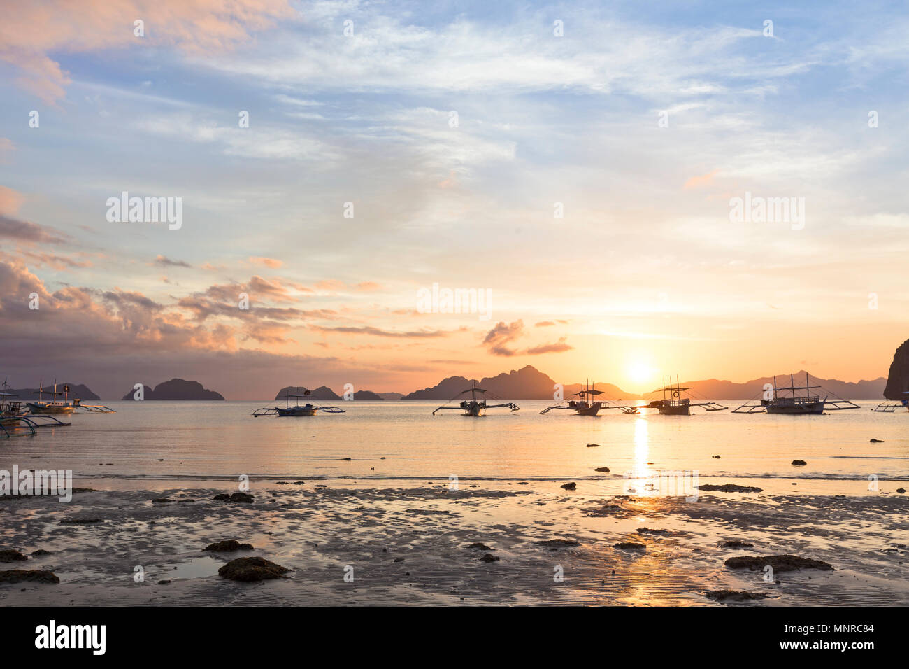 Sunset view from Corong Corong beach near El Nido, Bacuit archipelago ...