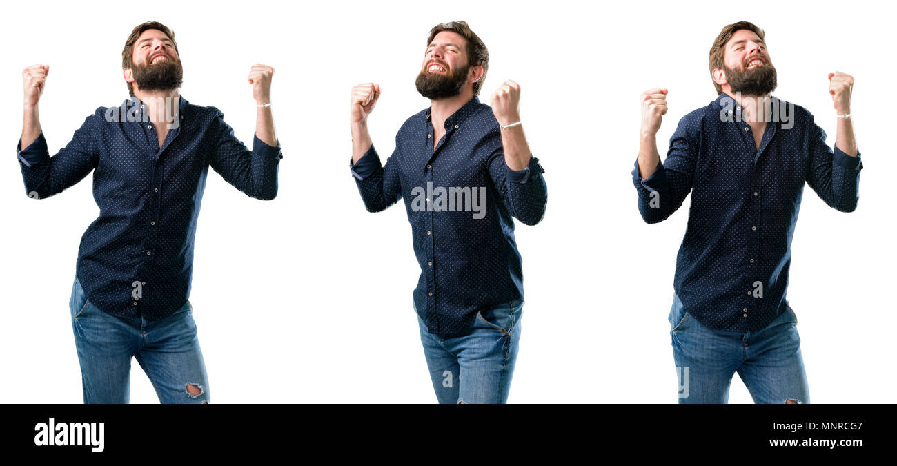 Young man with beard happy and excited expressing winning gesture ...