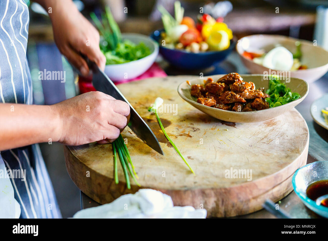 Chef making traditional cambodian meat dish at cooking class Stock ...