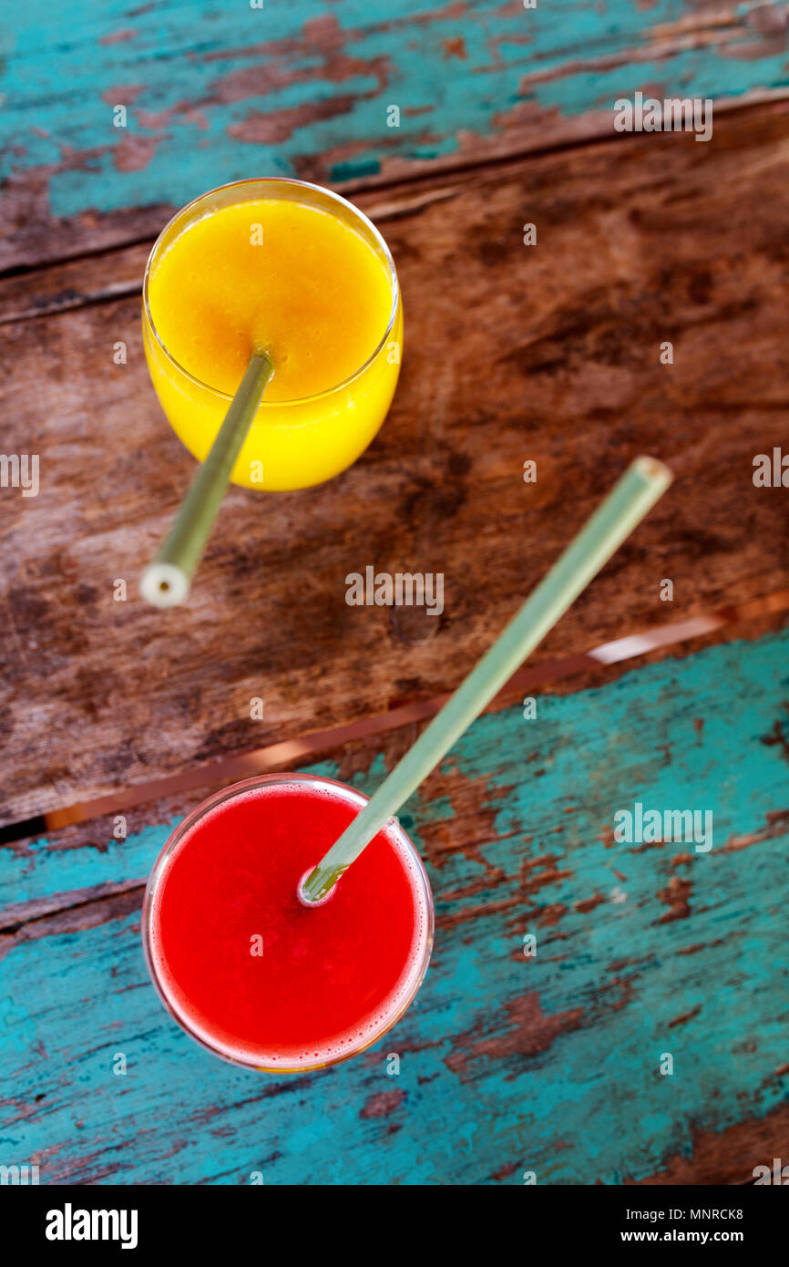 Tropical watermelon and mango juices on a table Stock Photo - Alamy