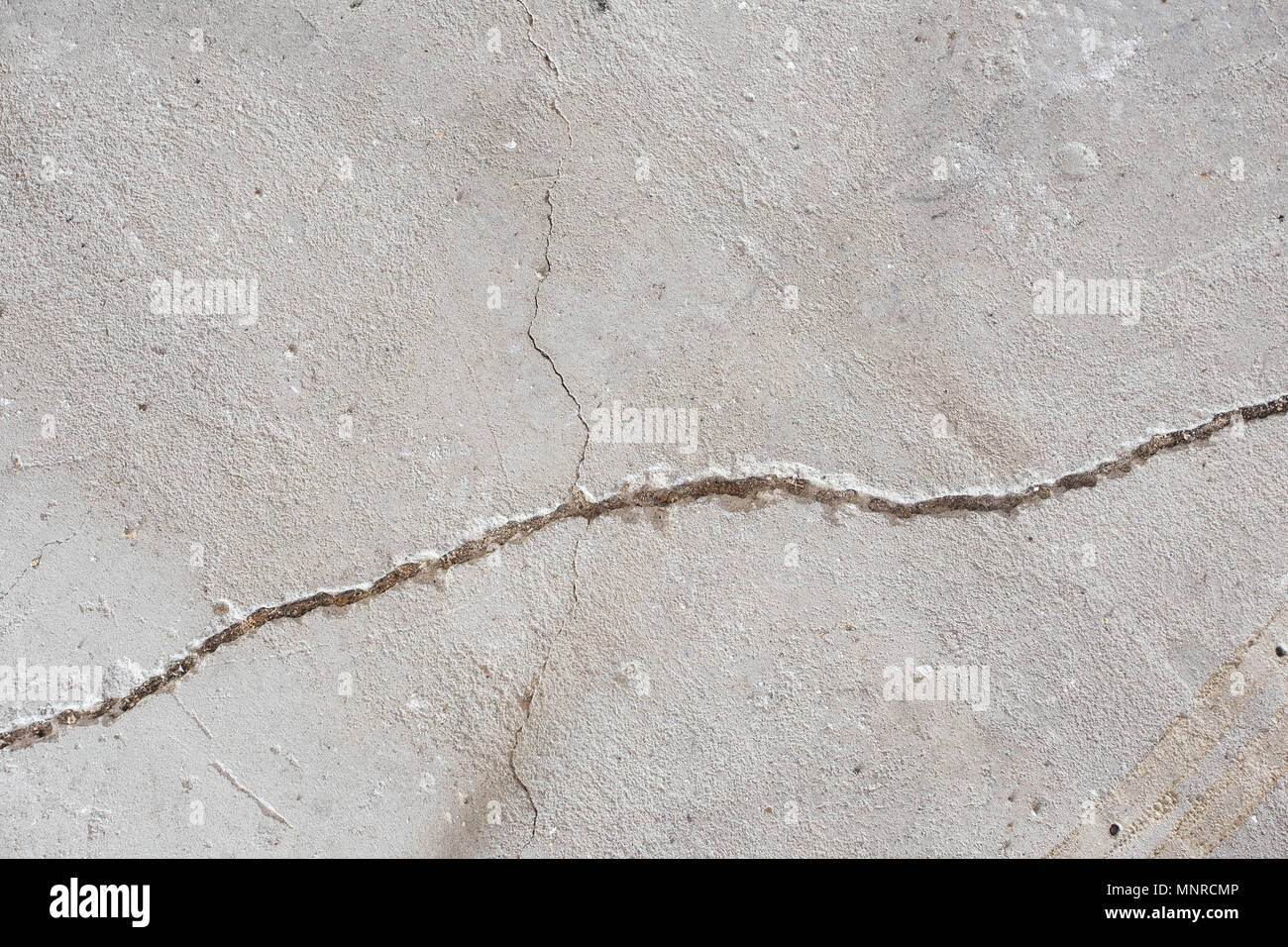 Cracked concrete texture closeup background Stock Photo - Alamy
