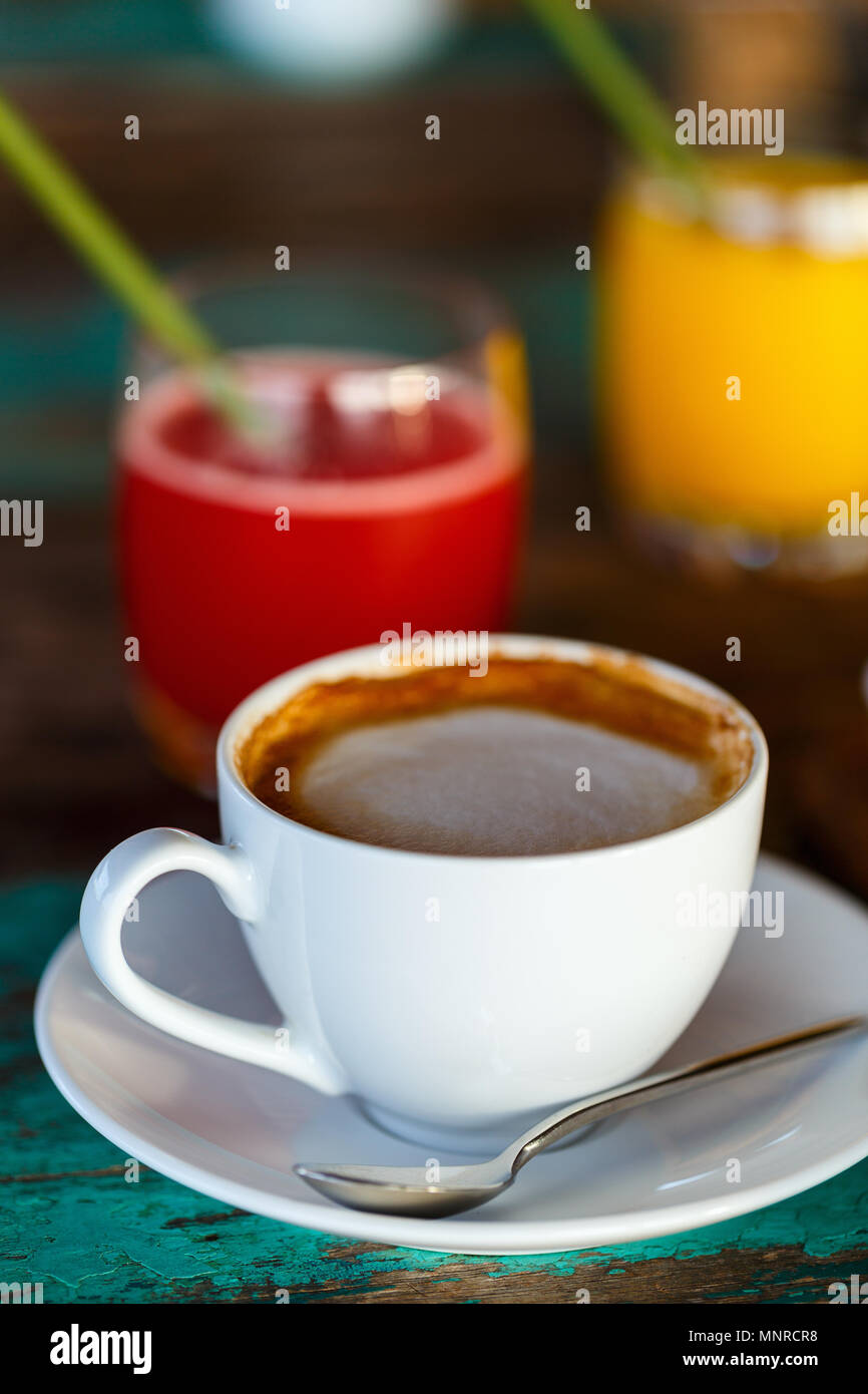 Coffee and tropical watermelon and mango juices on a table Stock Photo ...