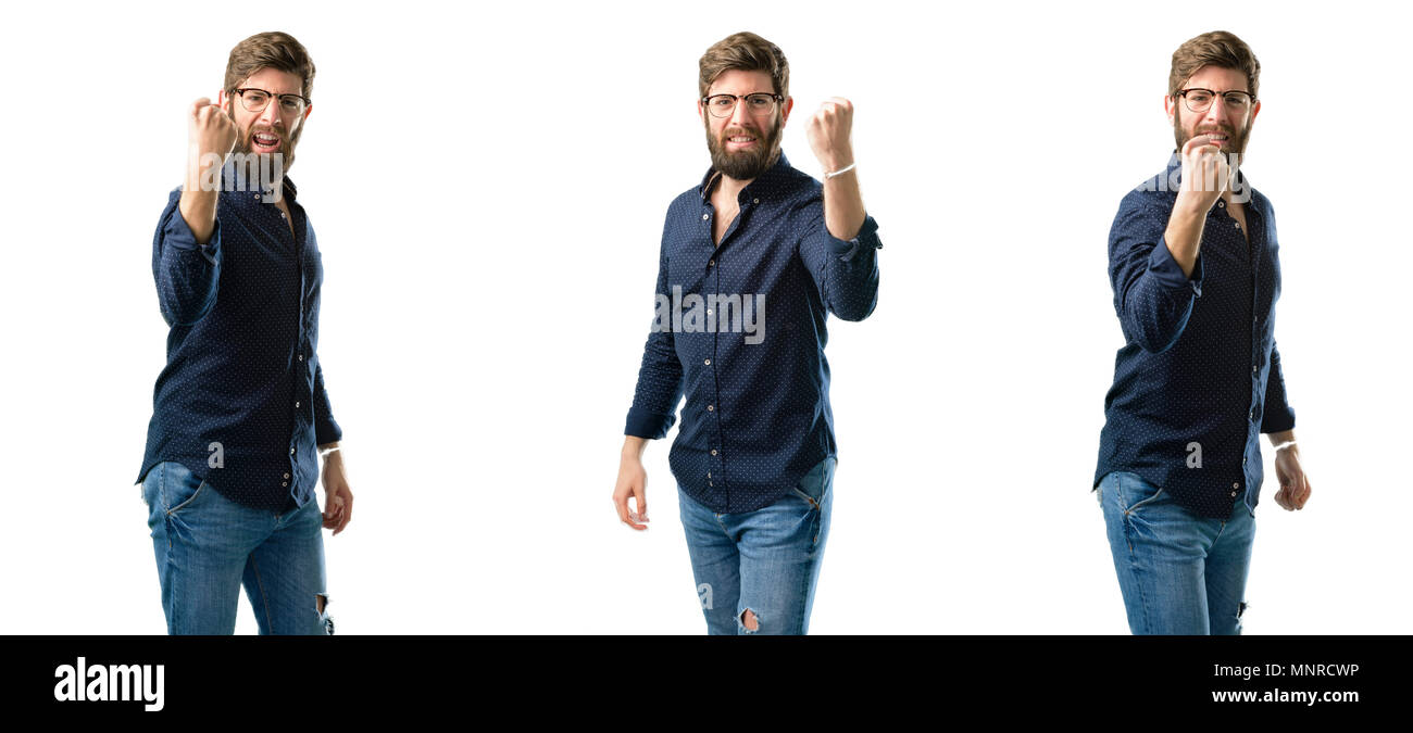 Young man with beard happy and excited expressing winning gesture ...