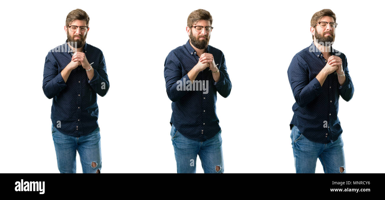 Young man with beard crying depressed full of sadness expressing sad ...