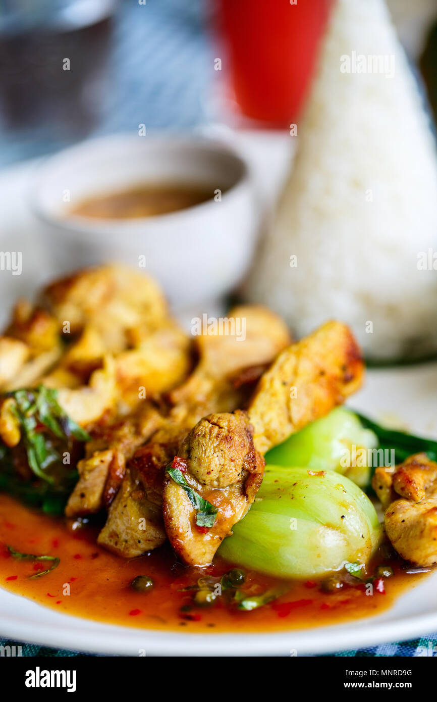 Delicious lunch of chicken, rice and green vegetables Stock Photo - Alamy
