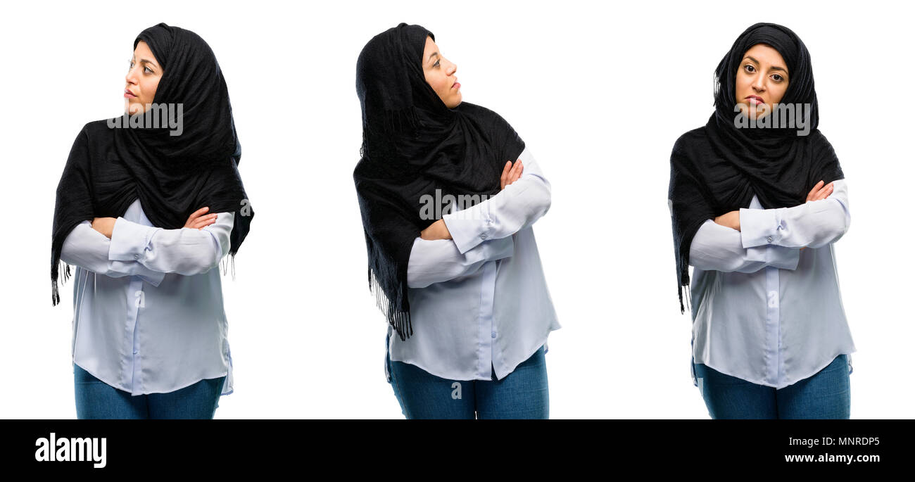 Arab woman wearing hijab with crossed arms confident and happy with a ...