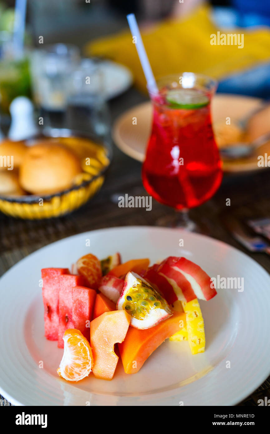 Exotic fruits platter amd tropical cocktails served at bar or ...