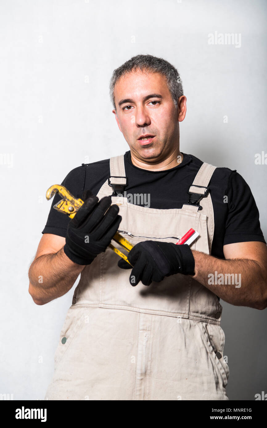 Man suit spanner wrench hi-res stock photography and images - Alamy