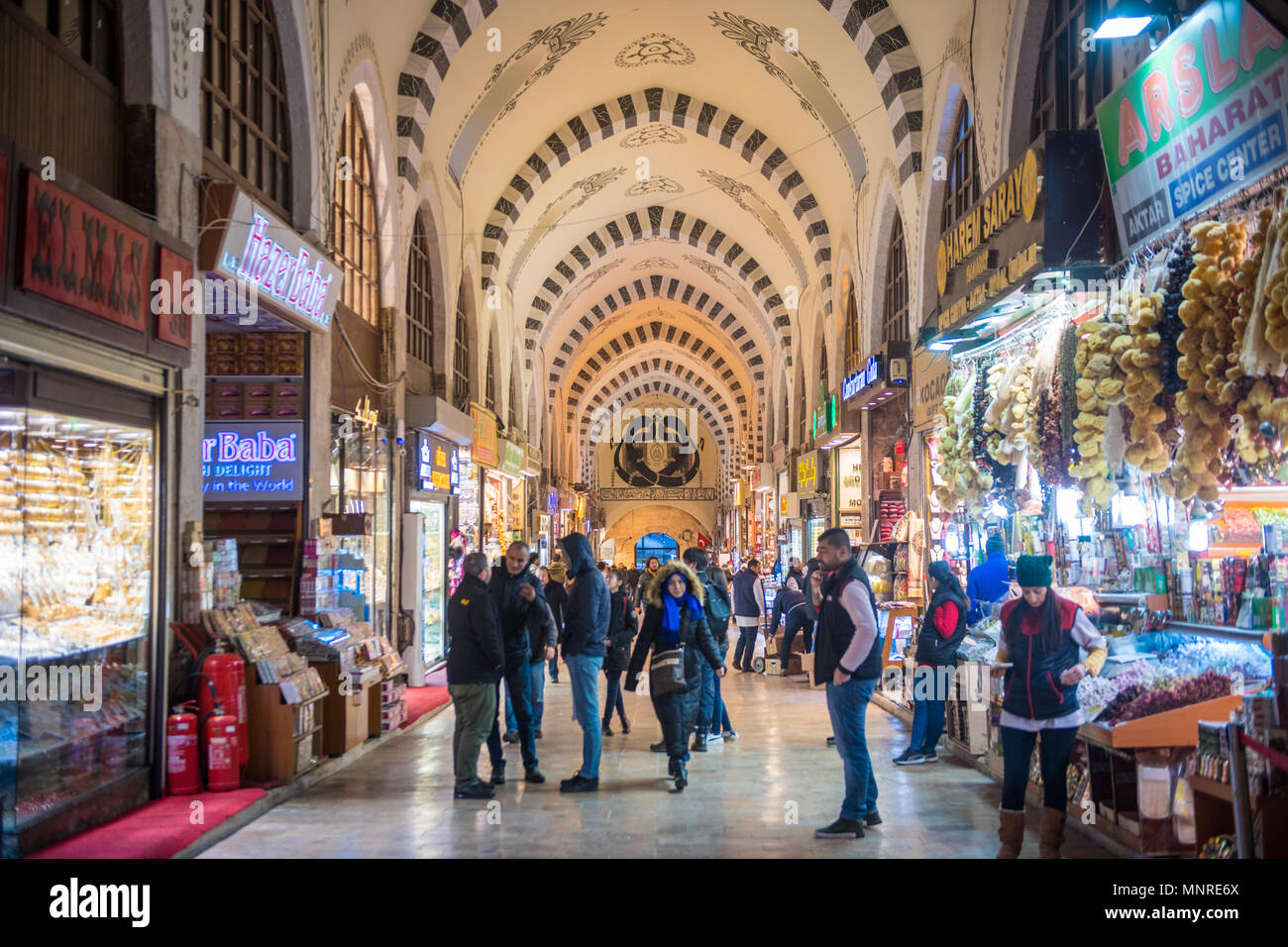 Shoppers walk up and down the main thoroughfare of the Istanbul Spice ...