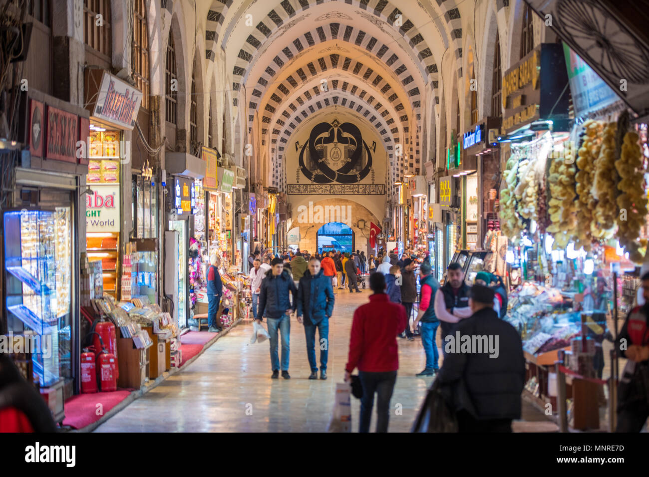Shoppers walk up and down the main thoroughfare of the Istanbul Spice ...