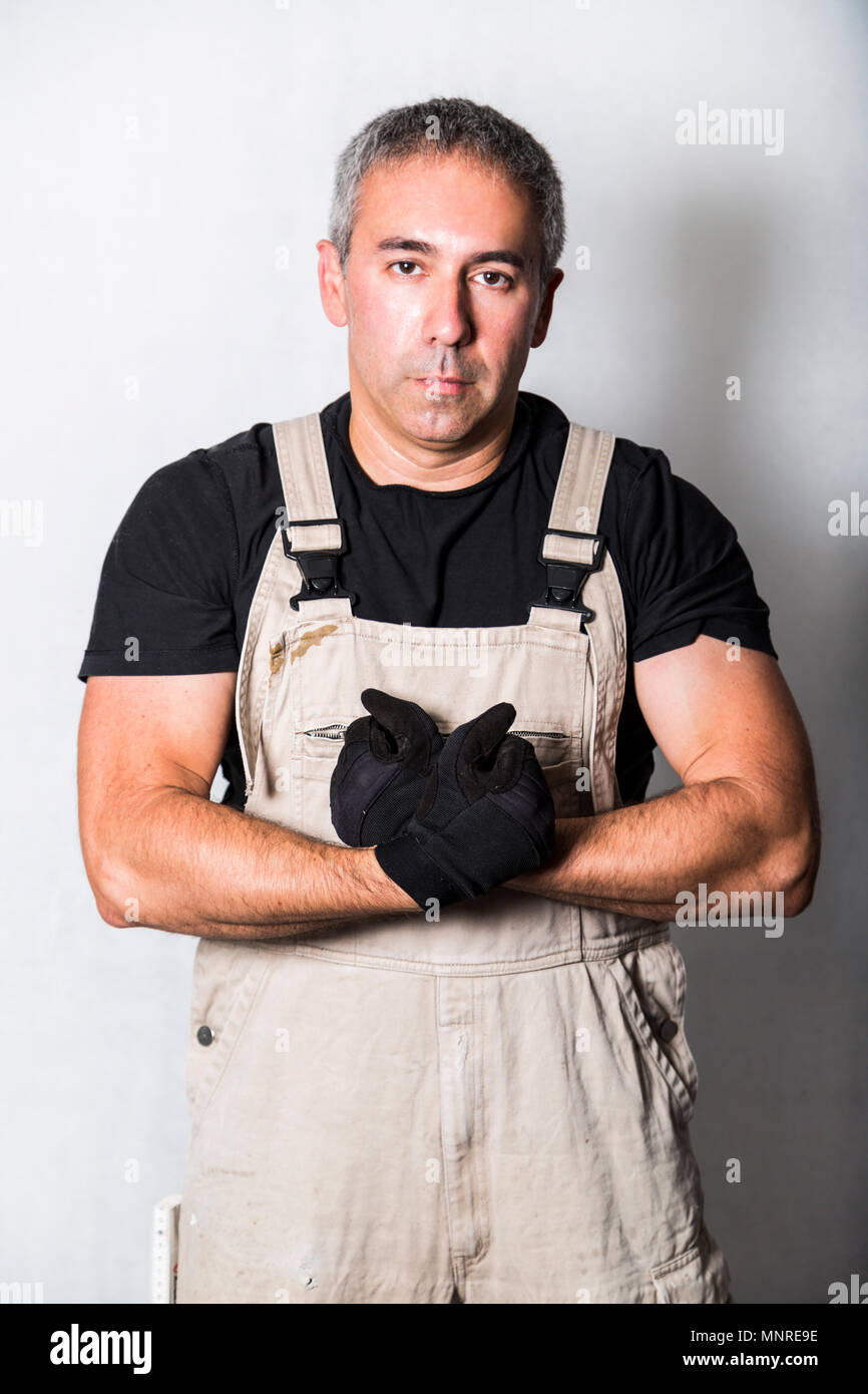 House repair man muscle hi-res stock photography and images - Alamy