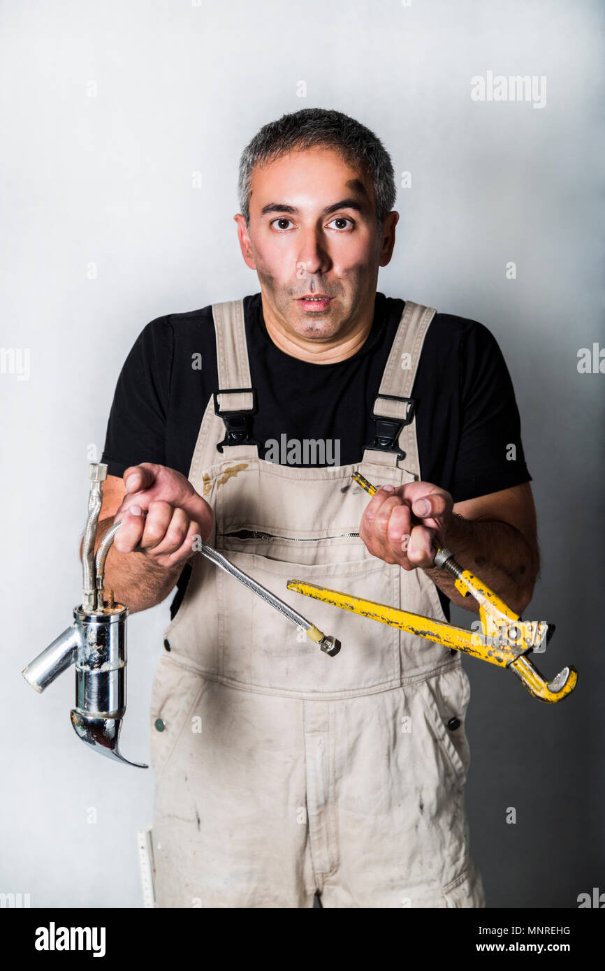 Male man stupid unqualified worker specialist plumber, engineer or ...