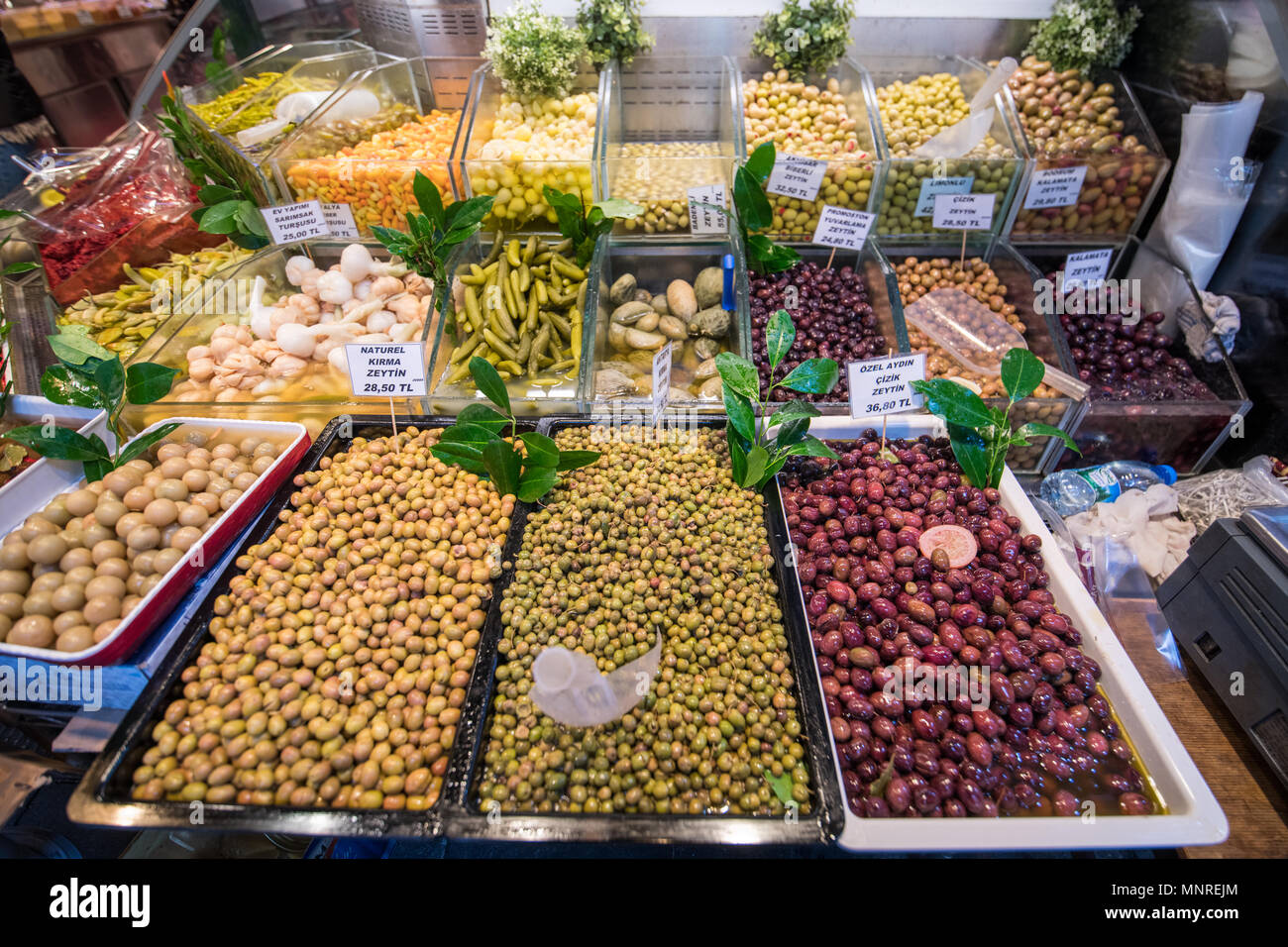Bin contain a variety of pickled vegetables and olives available for ...