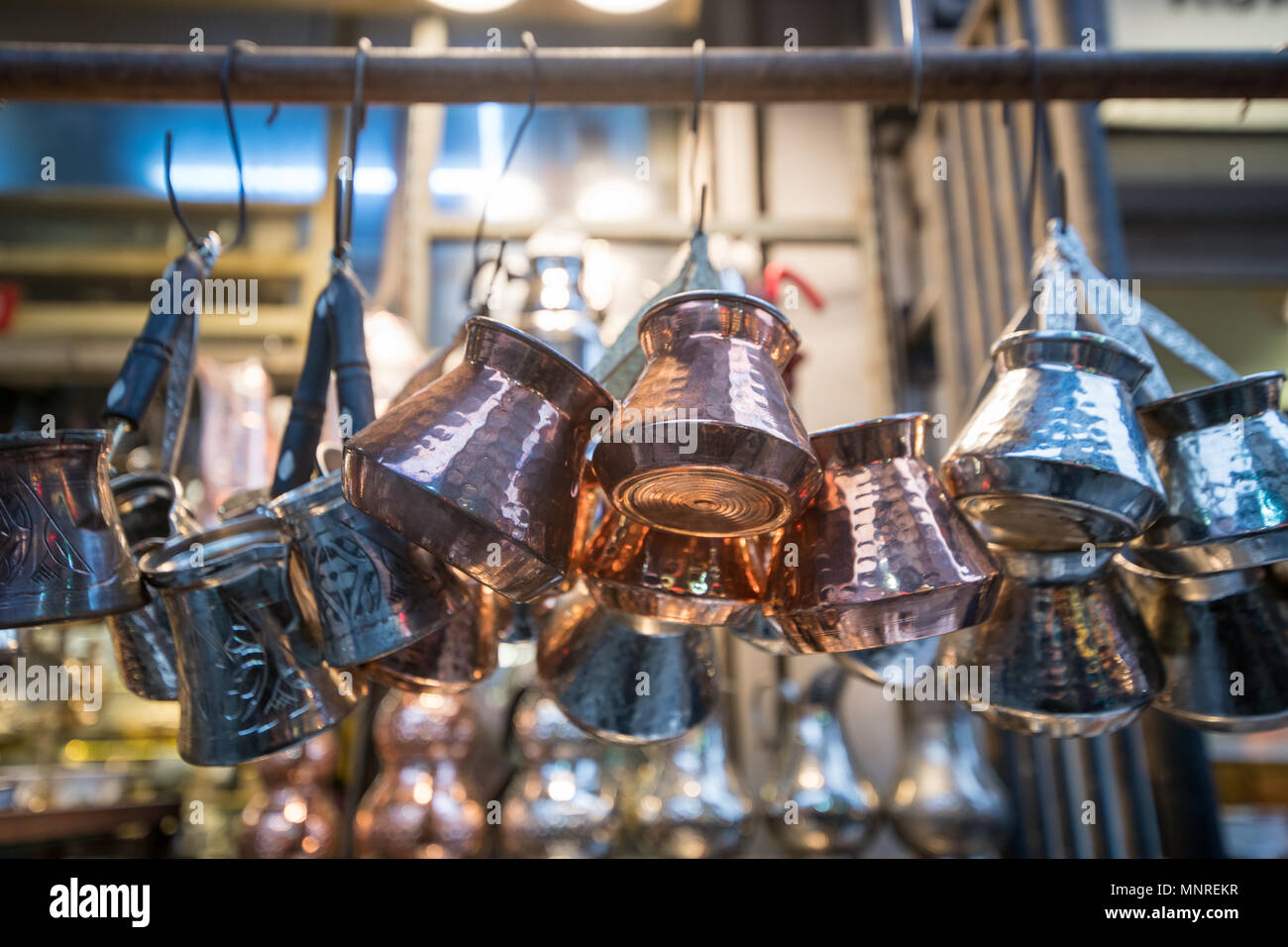 Silver and copper cezves hang on display for sale at Istanbul Spice ...
