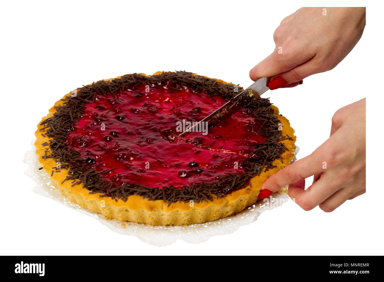 Berry pie cut into slices with a knife on a white background Stock ...