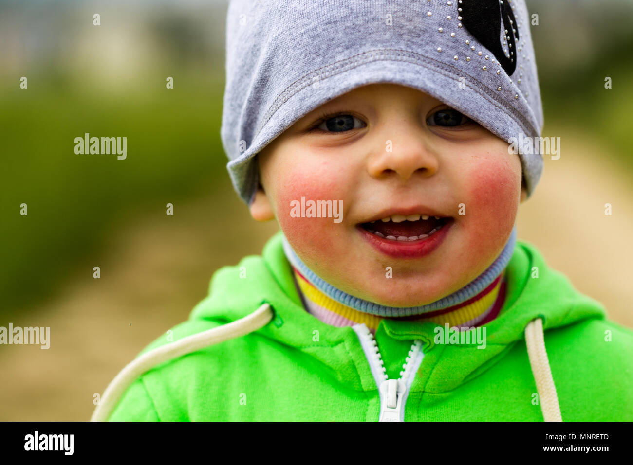 Emotional child on a walk outside the city Stock Photo - Alamy