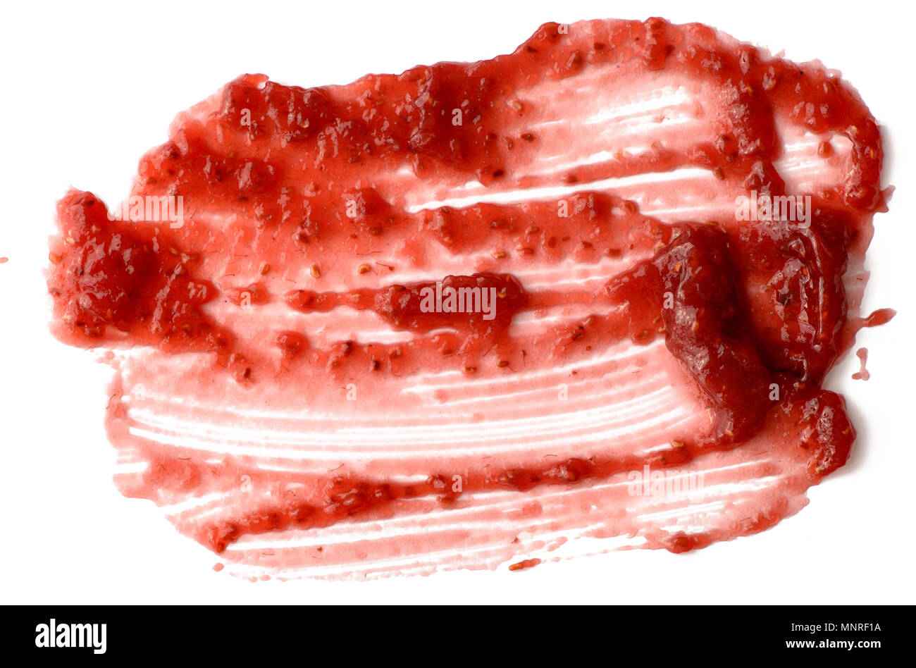 Raspberry jam spread isolated over white background Stock Photo - Alamy