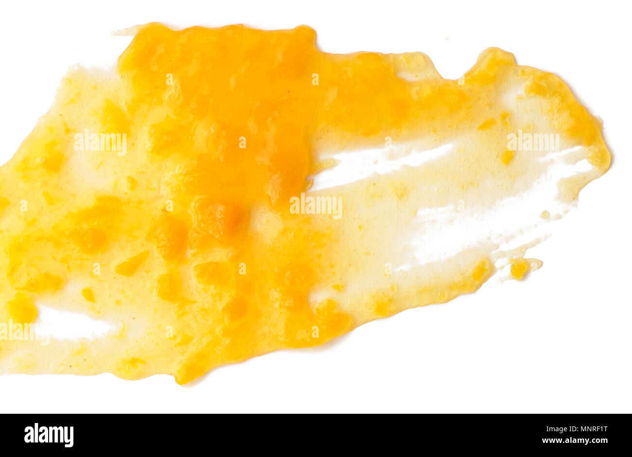 Apricot jam spread isolated over white background Stock Photo - Alamy