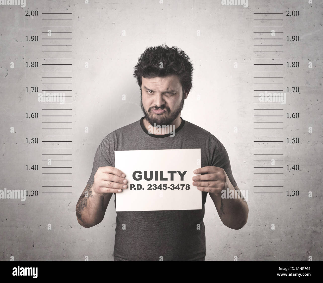 Caught guilty man with ID signs on his hand Stock Photo - Alamy