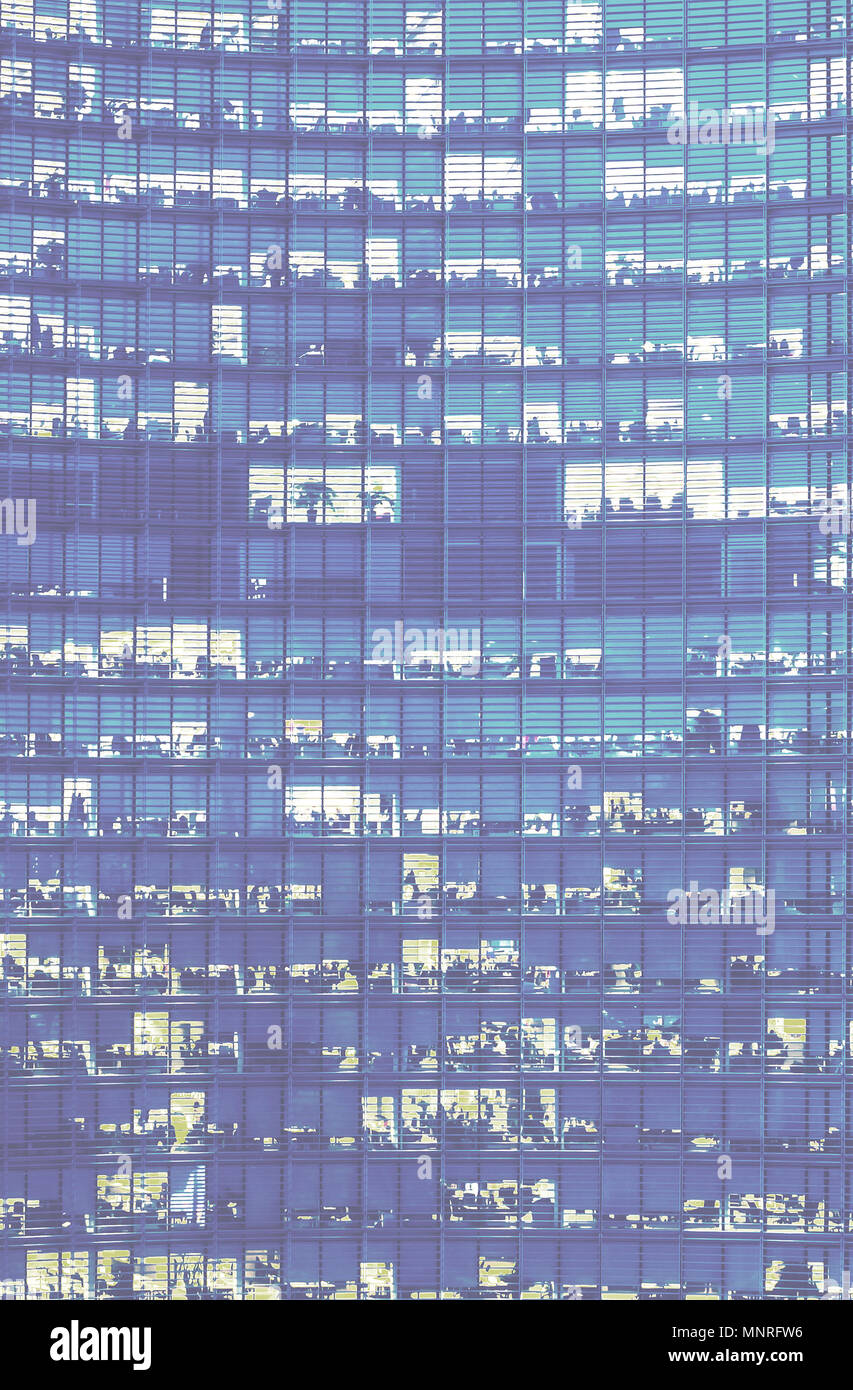 High rise office building with many floors and visible but anonymous ...