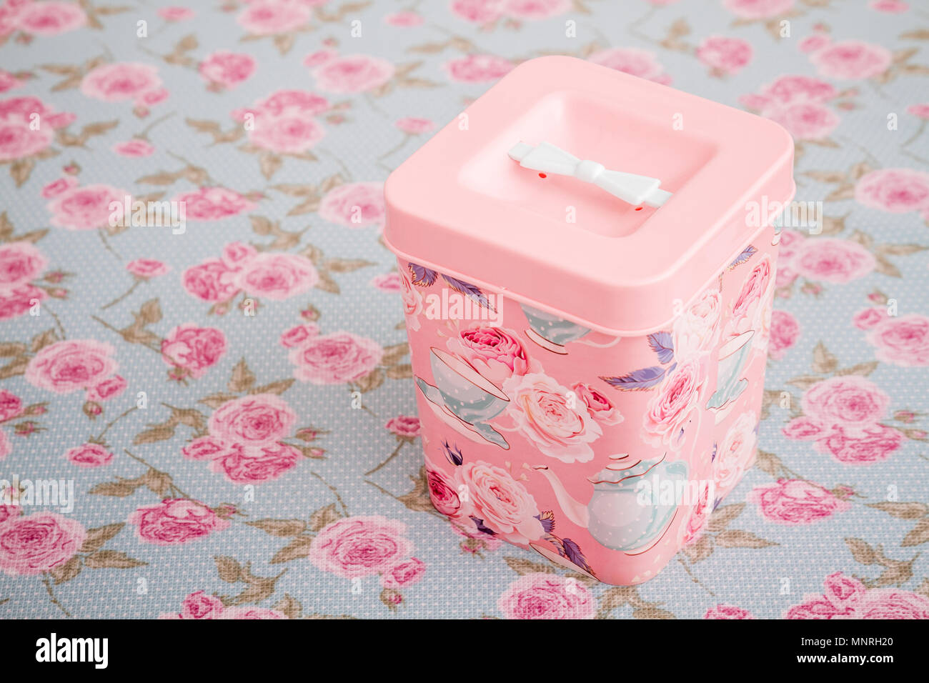 Vintage multi purpose storage container with floral pattern Stock Photo ...