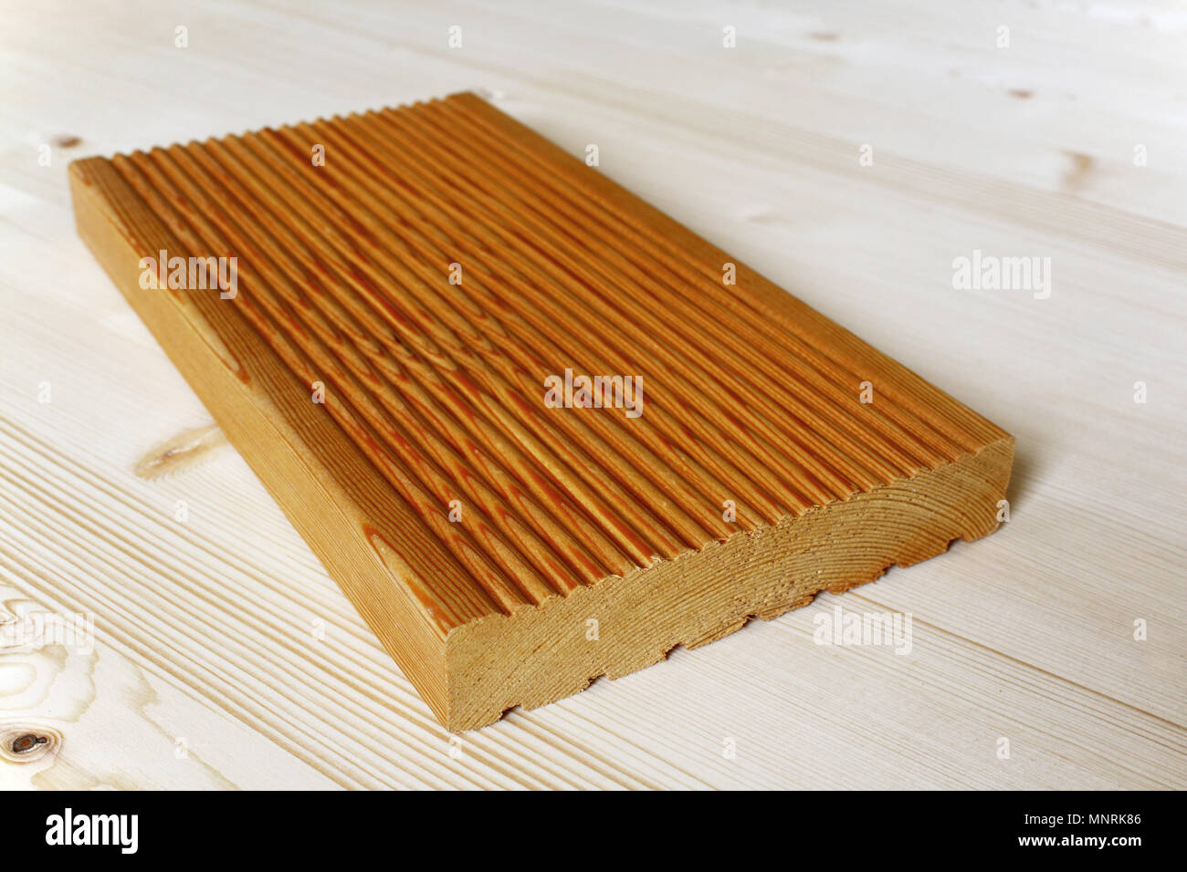 Special terrace panel made from larch wood Stock Photo - Alamy