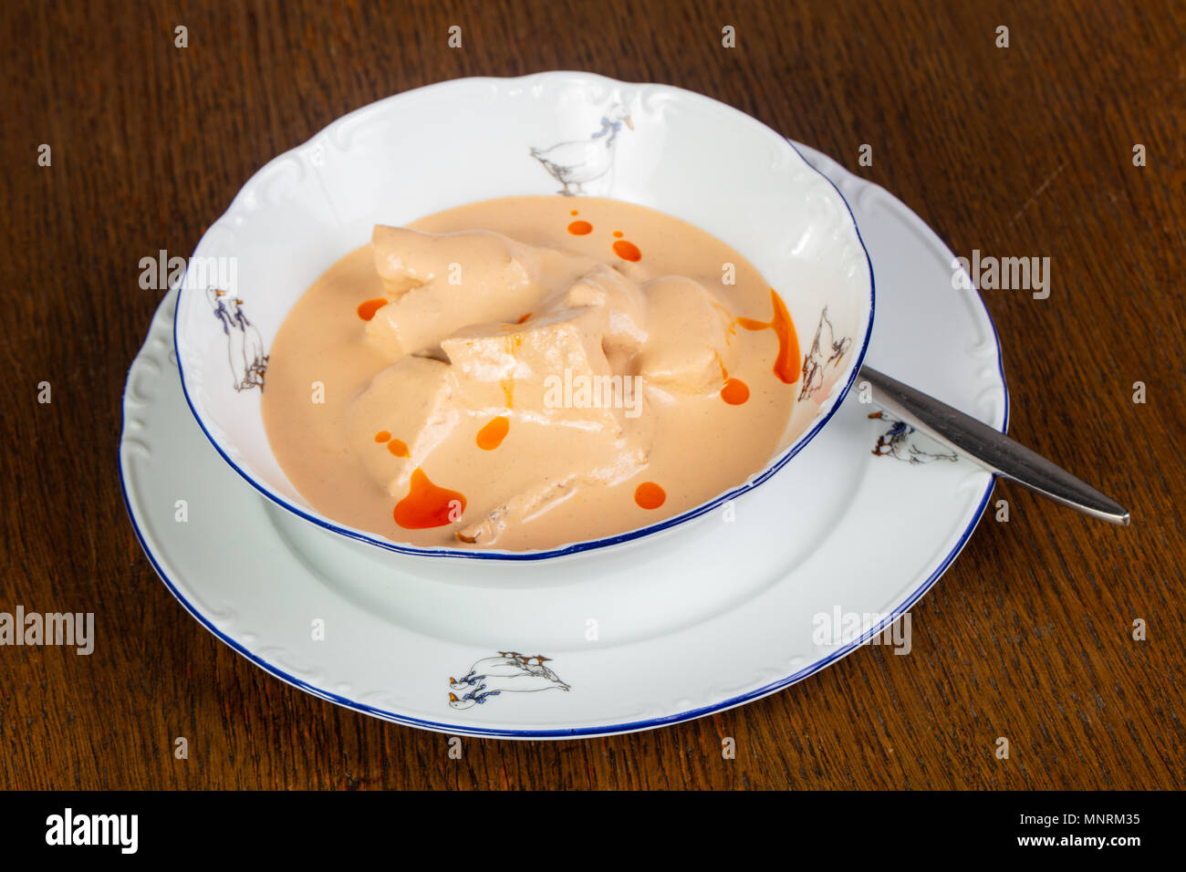 Georgian traditional cuisine - satsivi with chicken Stock Photo - Alamy