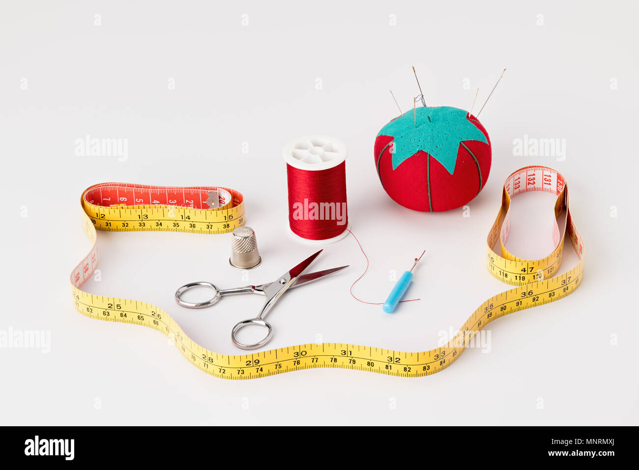 Sewing tools used in the making of a shirt Stock Photo - Alamy