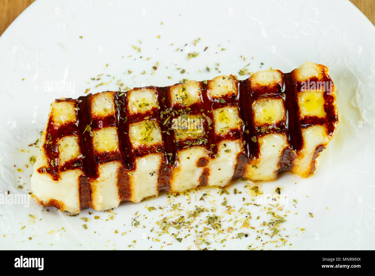 Grilled halloumi cheese with olive oil Stock Photo - Alamy