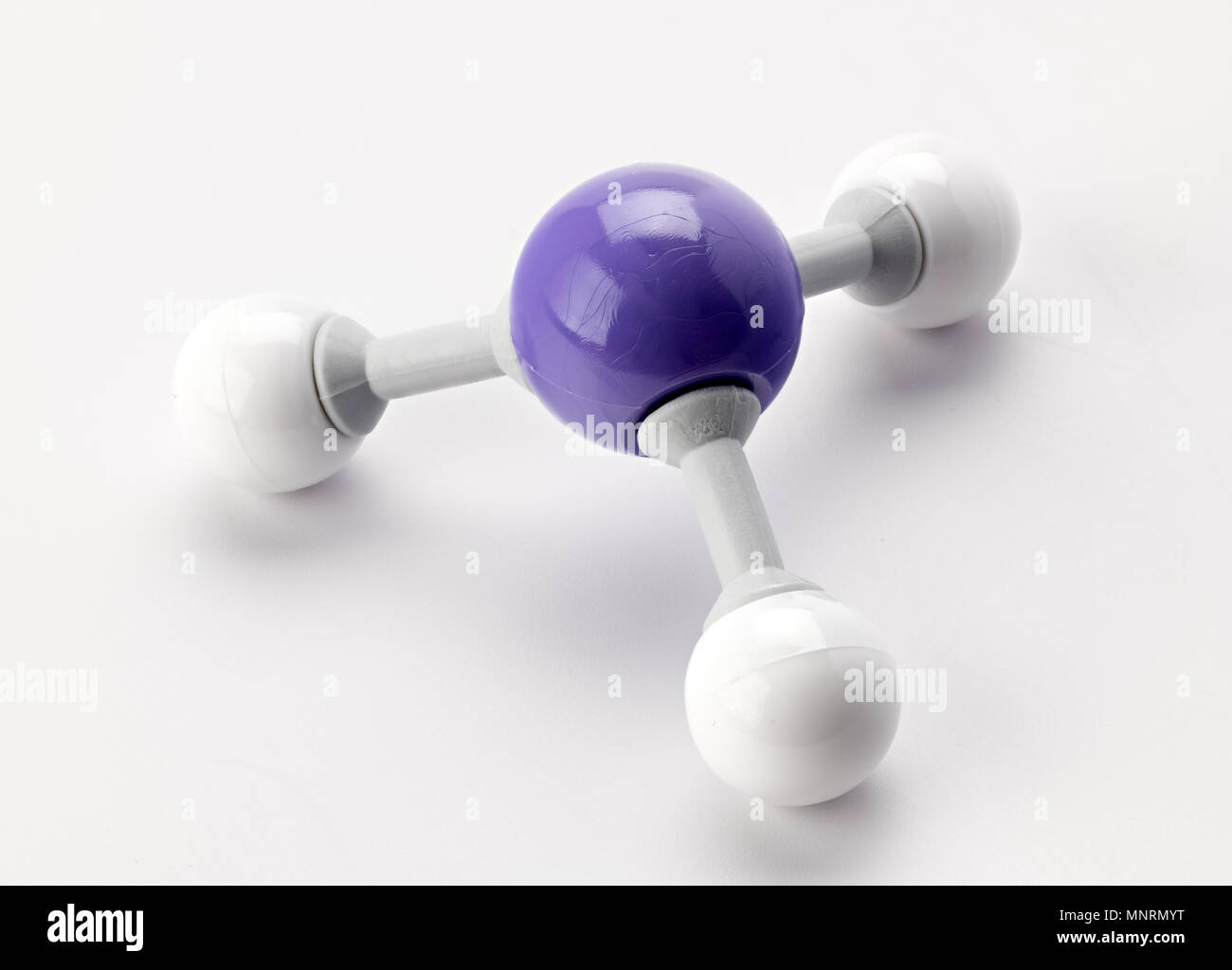 Purple and white chemical atom model Stock Photo - Alamy