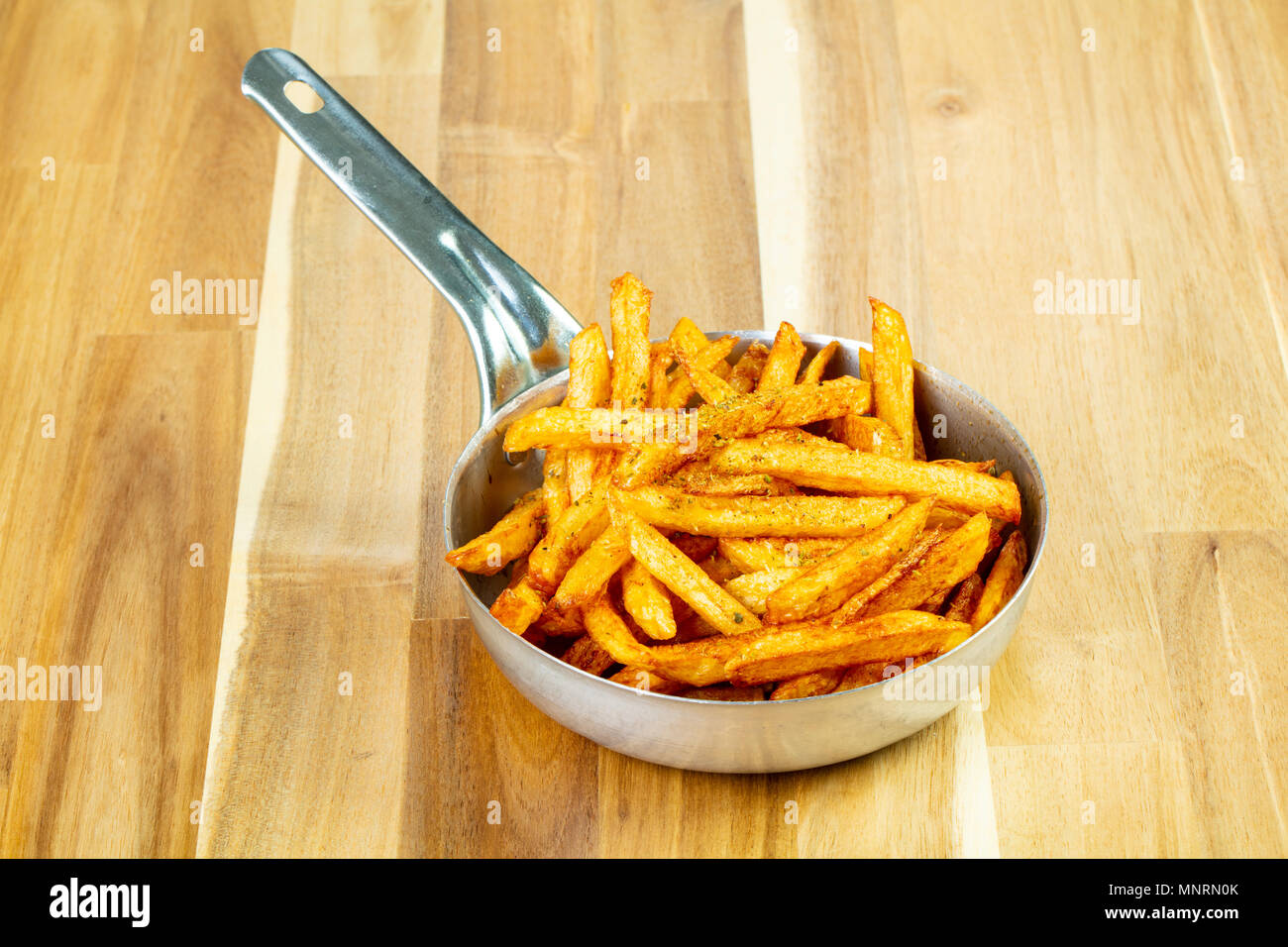 French fry potato with spices Stock Photo - Alamy