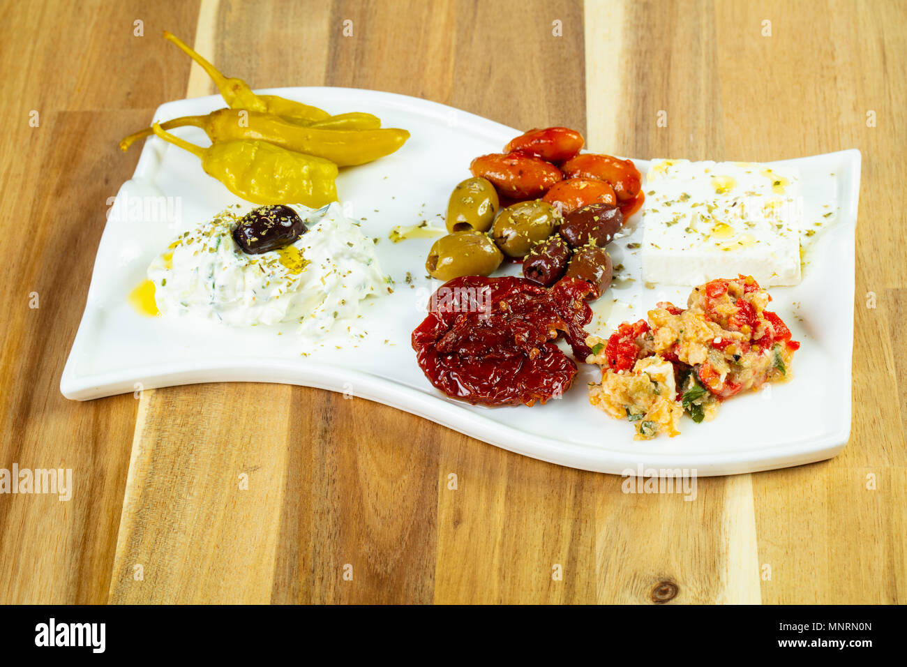 Greek traditional meze with dzadziki Stock Photo - Alamy