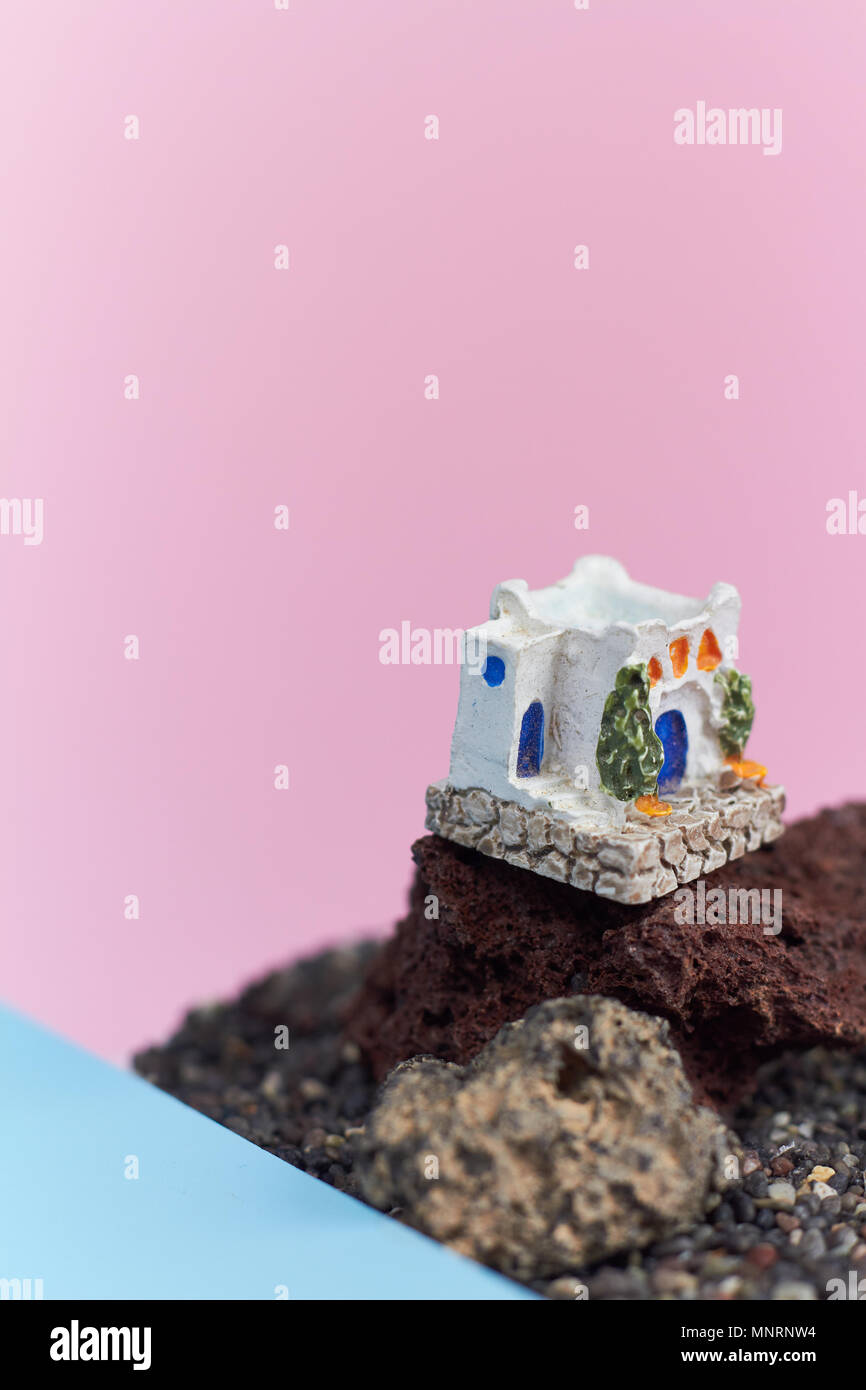 Animated model of a Greek house on a rock on a pink background Stock ...