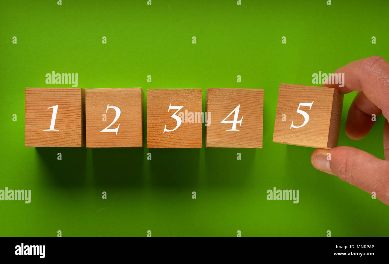 Numbers on wooden cubes hi-res stock photography and images - Alamy