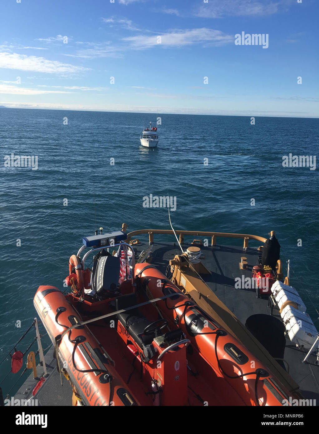 Coast Guard Cutter Naushon (WPB 1311) and crew conduct tow training ...