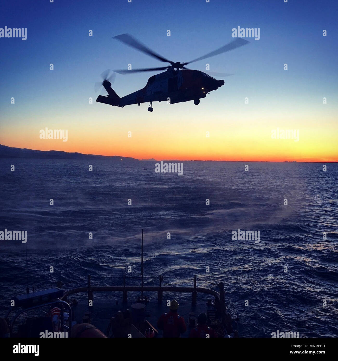 Coast Guard Cutter Naushon (WPB 1311) and crew conduct helicopter hoist ...
