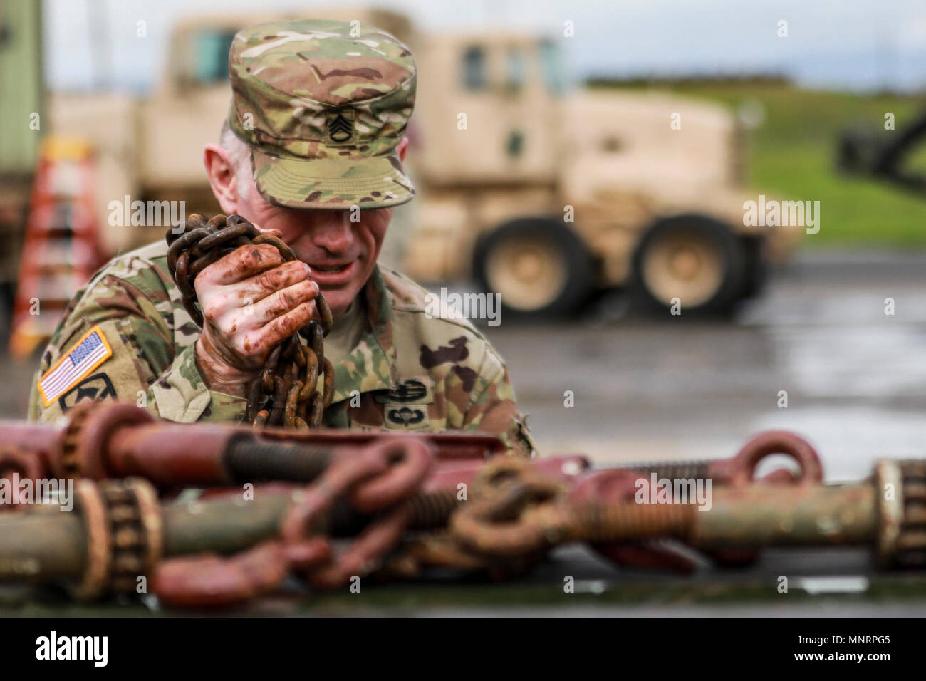 A U.S. Army Reserve Soldier prepares for convoy operations during ...