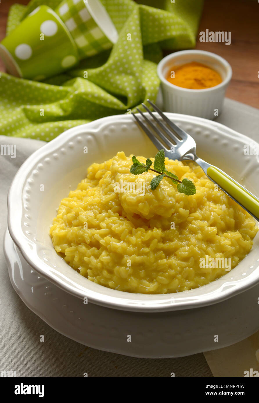 italian risotto with mint leaf on porcelain plate - closeup Stock Photo ...