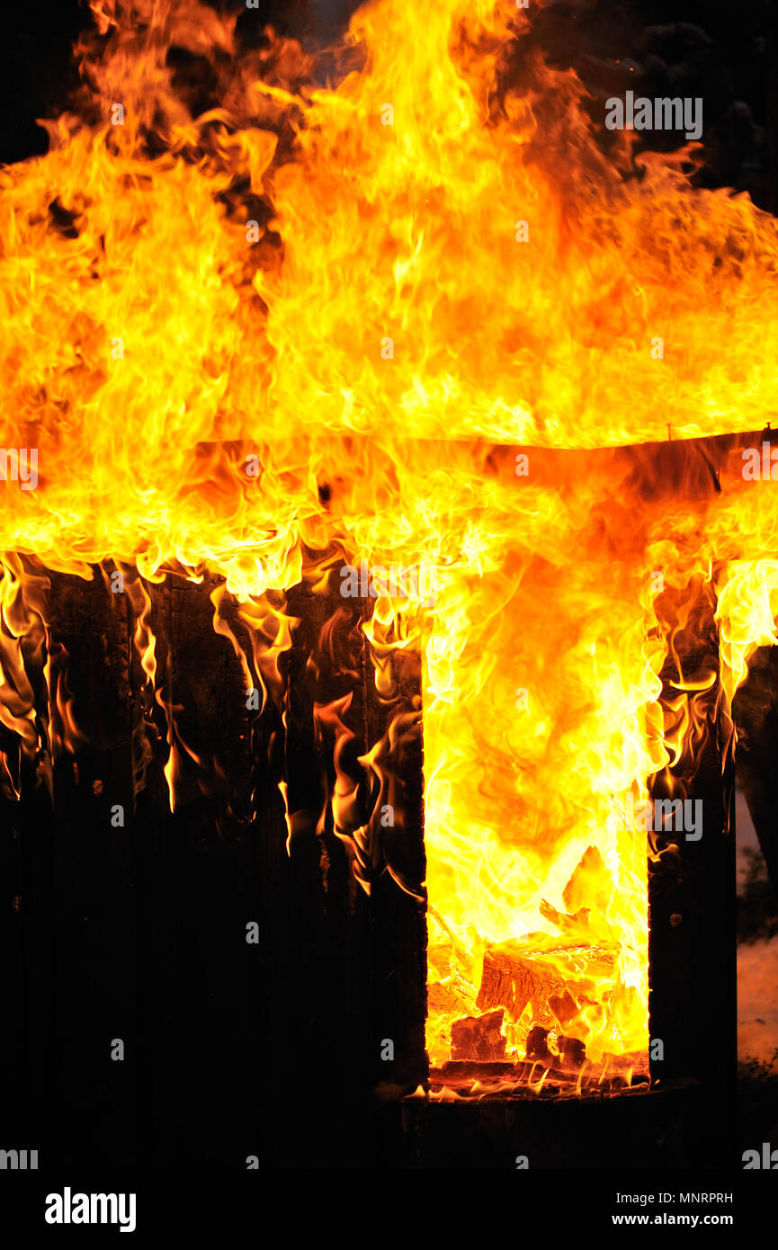 Burning fire flames. Old wooden shed on fire Stock Photo - Alamy