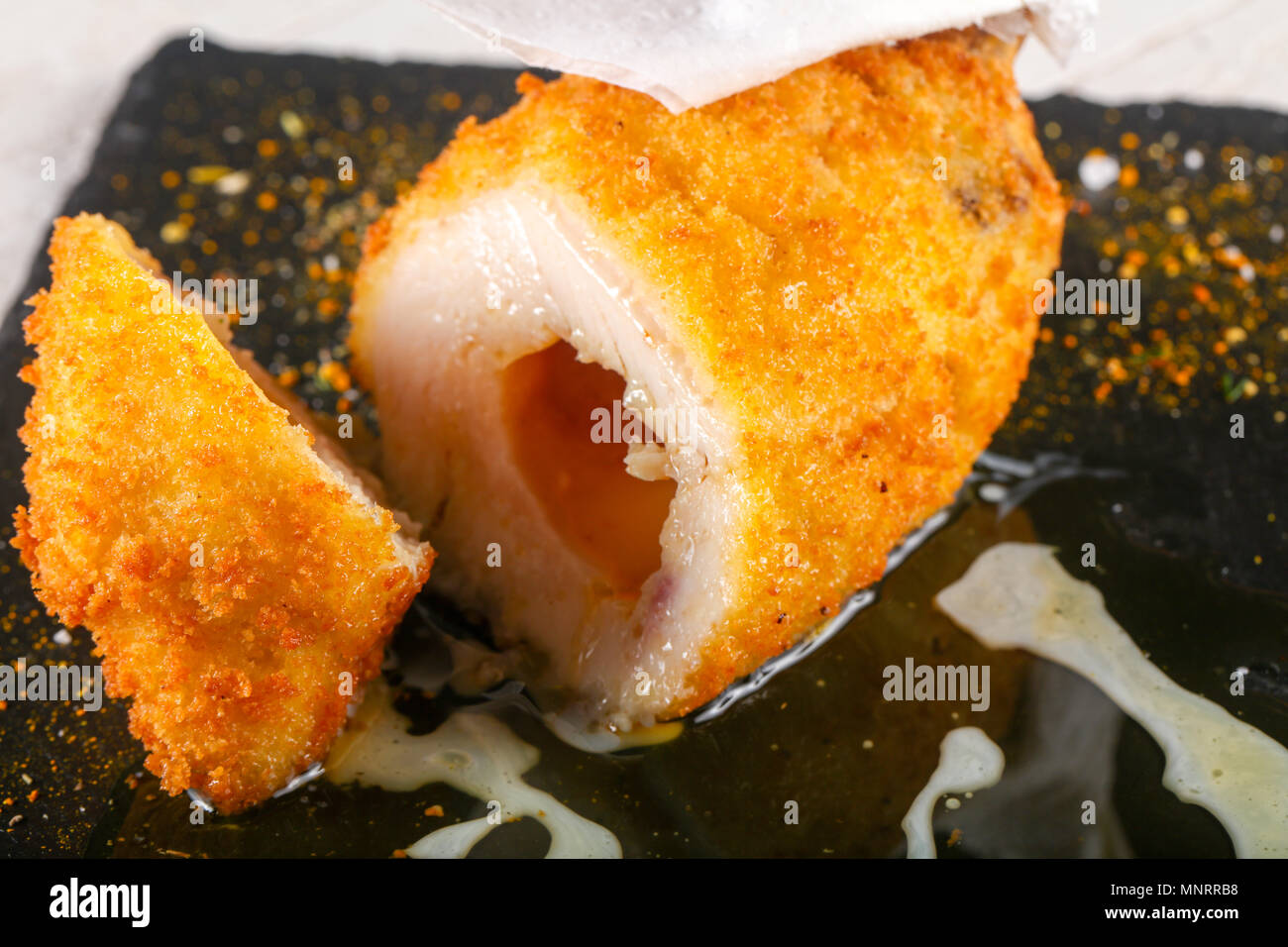 Chicken kiev breaded stuffed chicken hi-res stock photography and ...