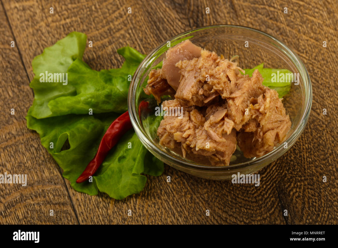 Canned tuna fish in the bowl ready for cooking Stock Photo - Alamy