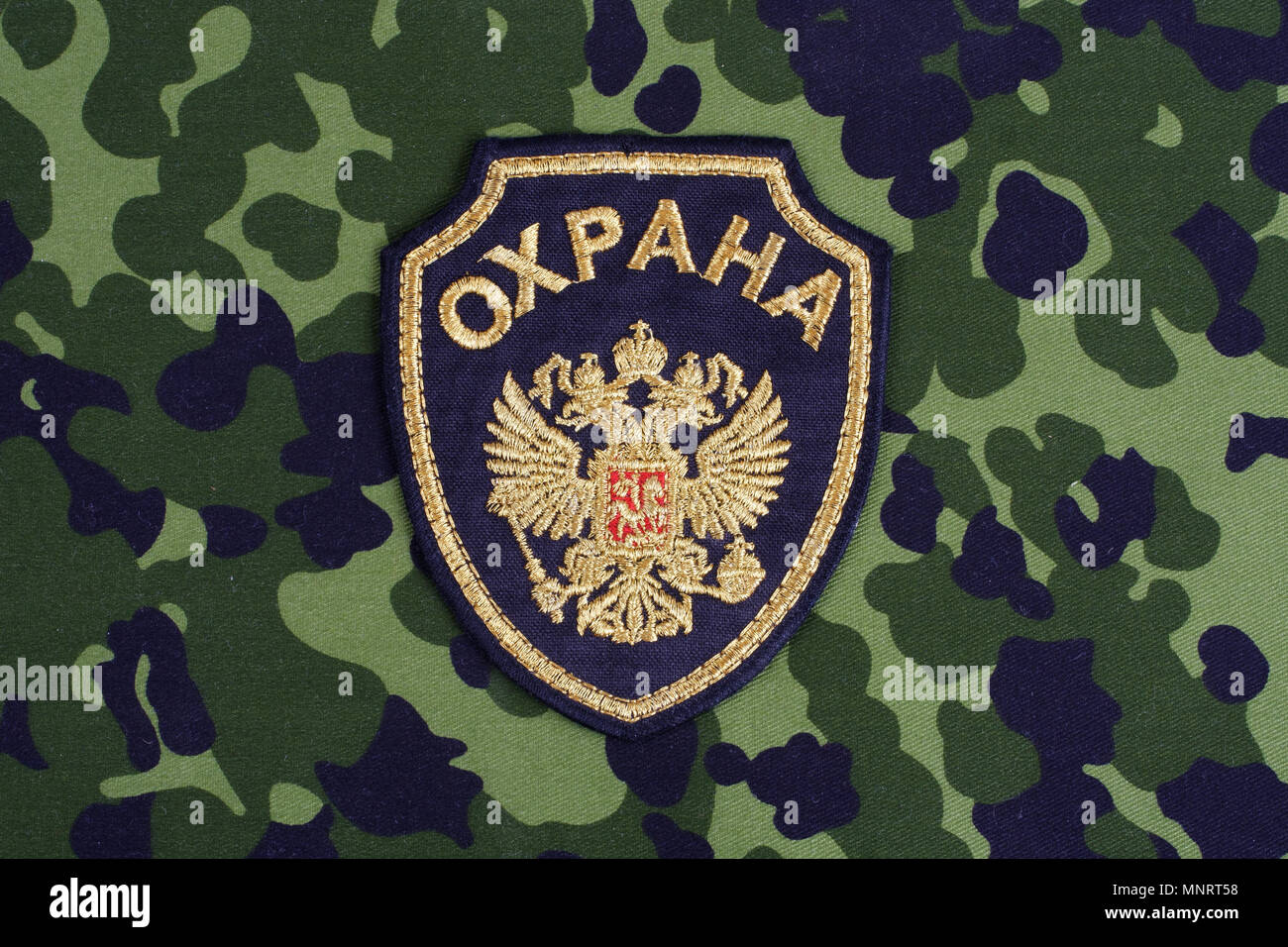 KIEV, UKRAINE - Apr. 26, 2015. Russian private security uniform badge ...
