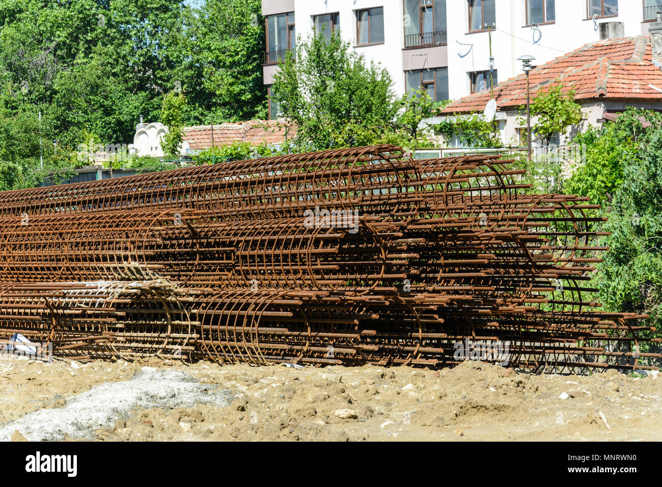 round cage stack of rebar reinforcement on a field Stock Photo - Alamy