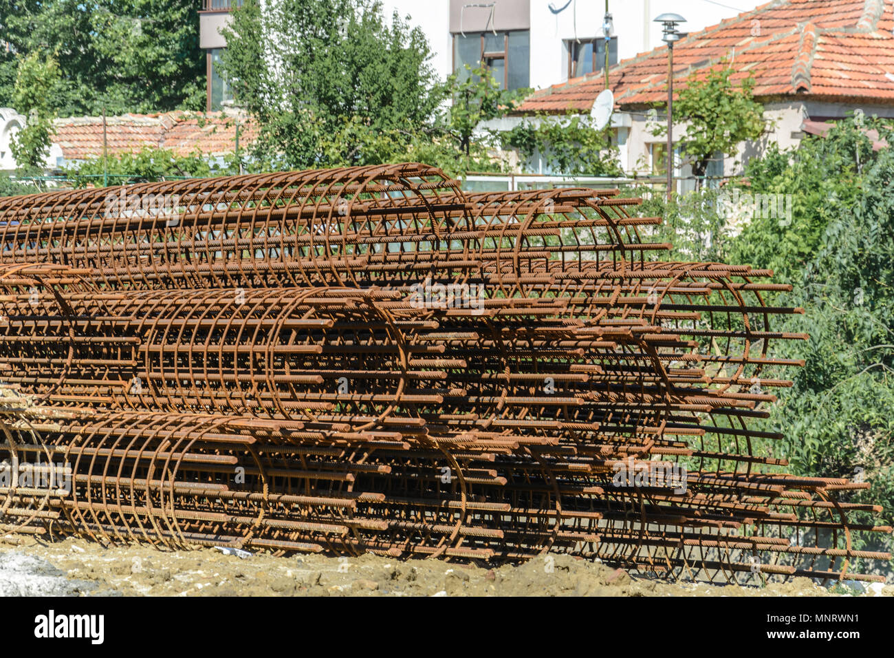 round cage stack of rebar reinforcement on a field Stock Photo - Alamy