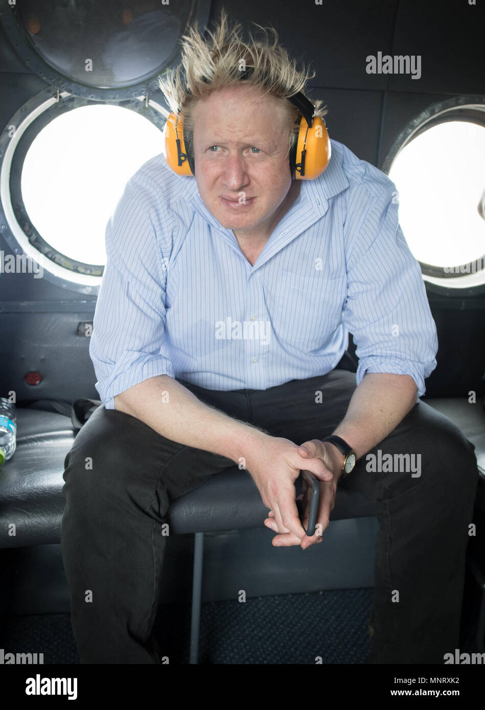 Foreign Secretary Boris Johnson on board a helicopter during a visit to ...
