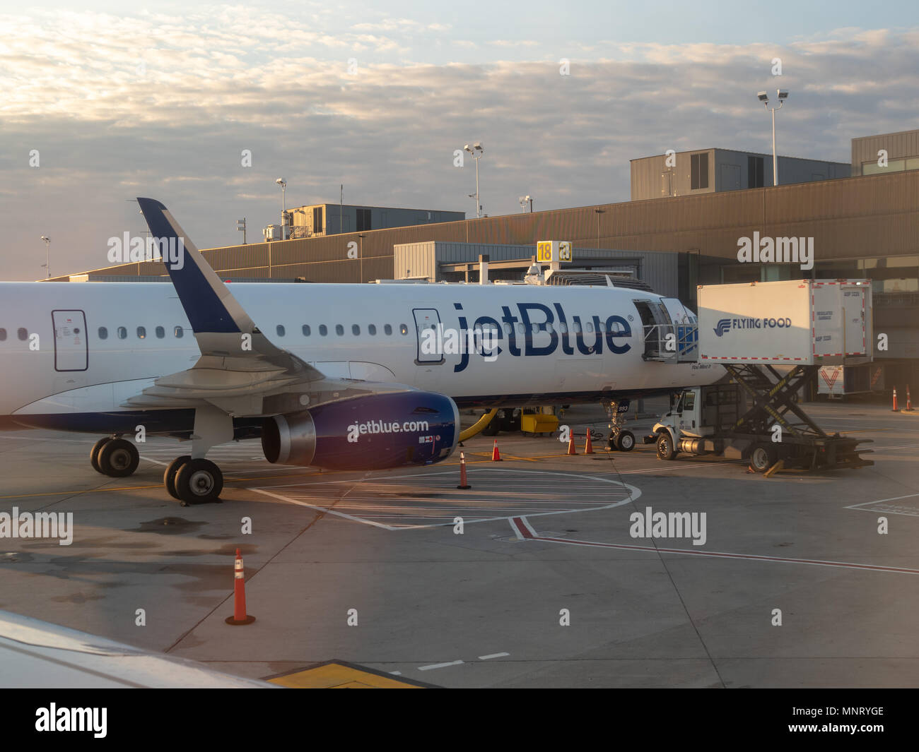 NEW YORK, NY – May 11, 2018: JetBlue Airbus A320 sitting on JFK runway ...